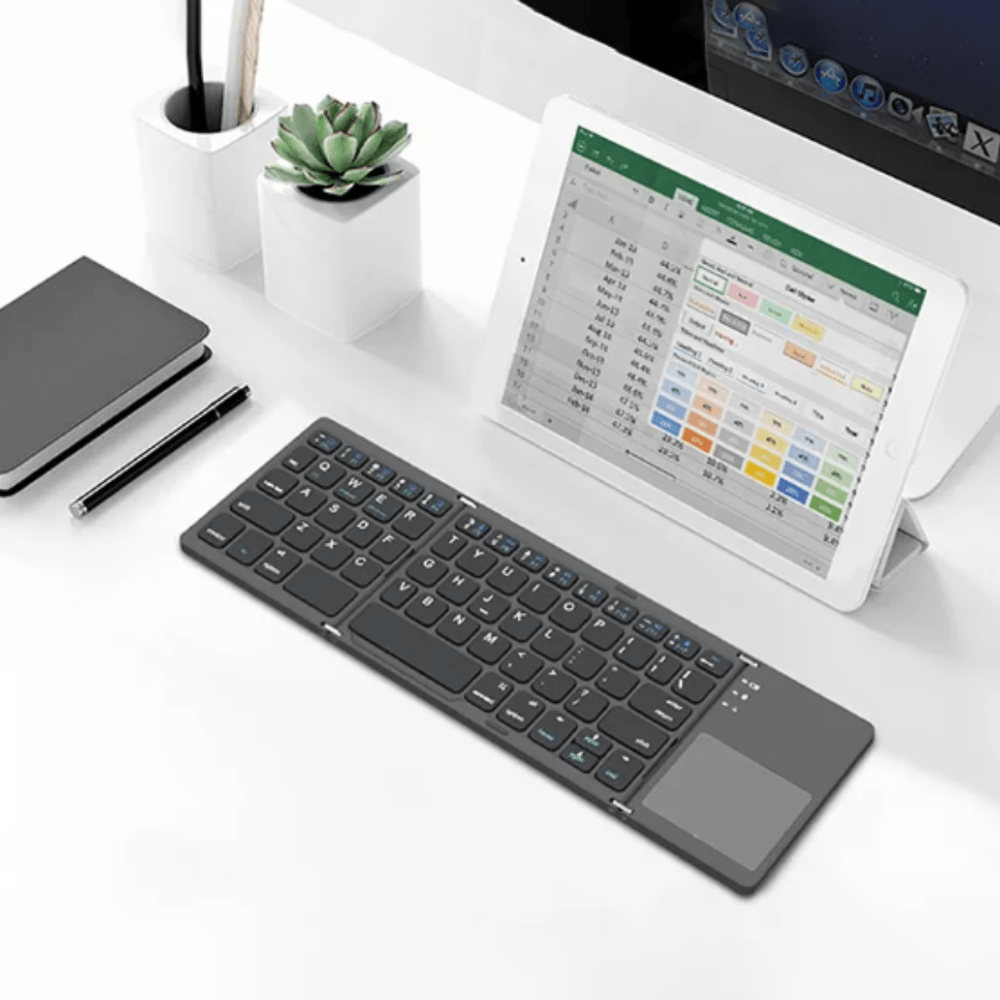 Mini Teclado Inalámbrico Bluetooth Plegable Con mousepad | plazaVea ...